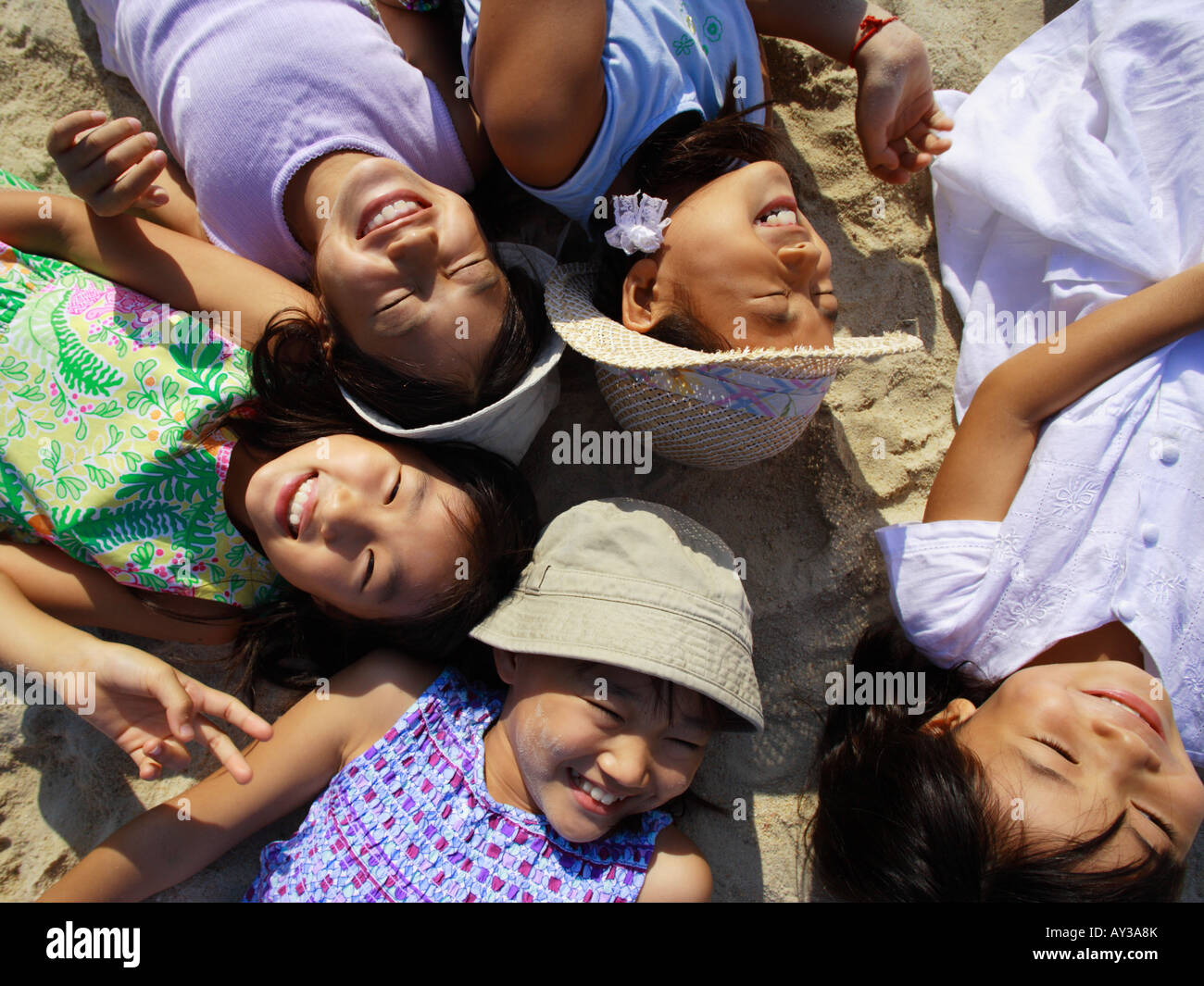 Lying down in a circle hi-res stock photography and images - Alamy