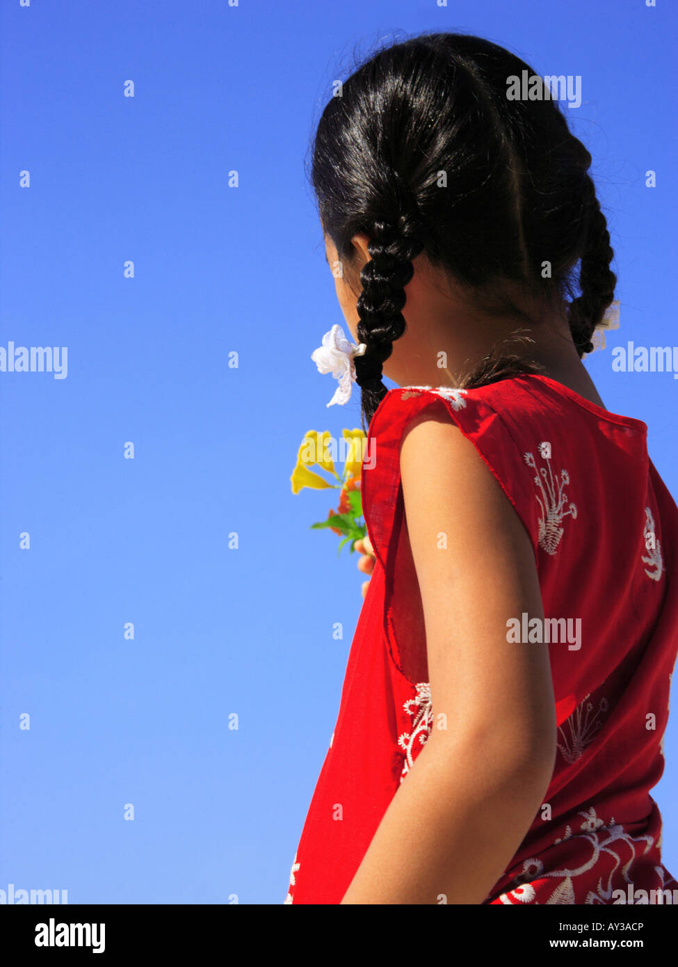 Side profile of a girl standing Stock Photo - Alamy