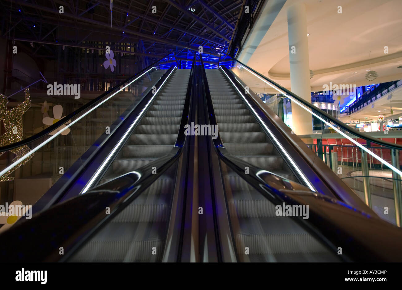 Escalator in shopping mall Stock Photo - Alamy
