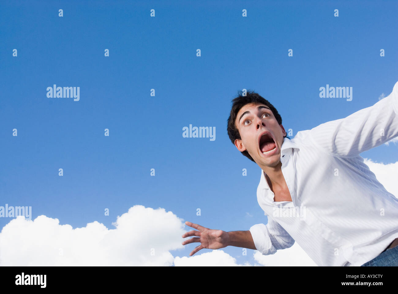 Frightened man yelling Stock Photo - Alamy