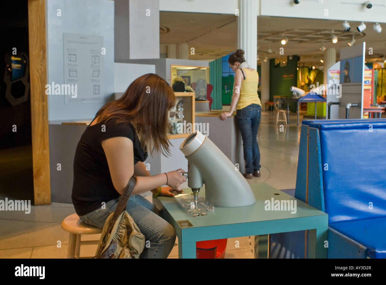 Two college students looking at exhibits in the Ecotarium Stock Photo ...