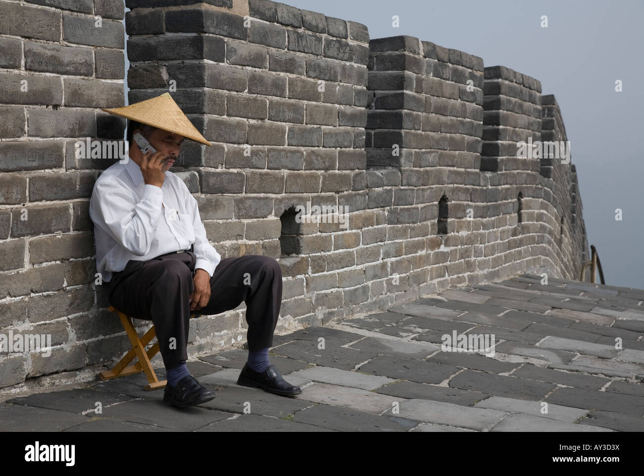Chinese business man on the Great Wall of China Stock Photo - Alamy