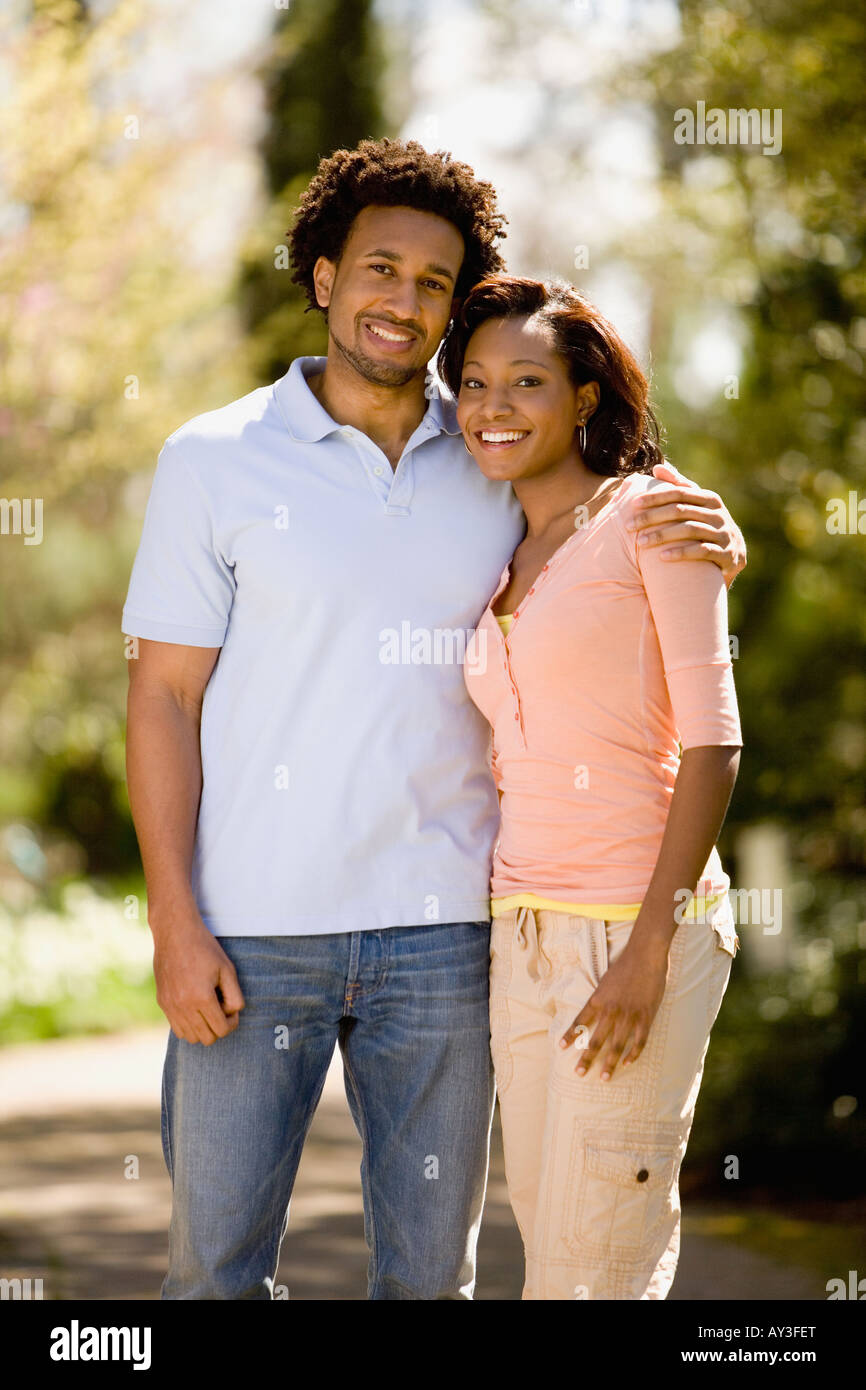 African American couple hugging Stock Photo - Alamy