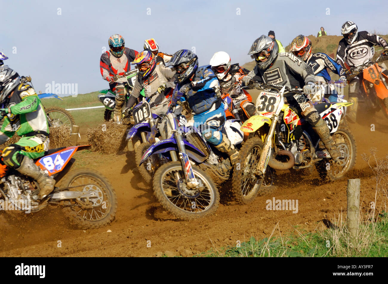 a guy rider on a motocross bile motorcycle jumping and racing big air ...