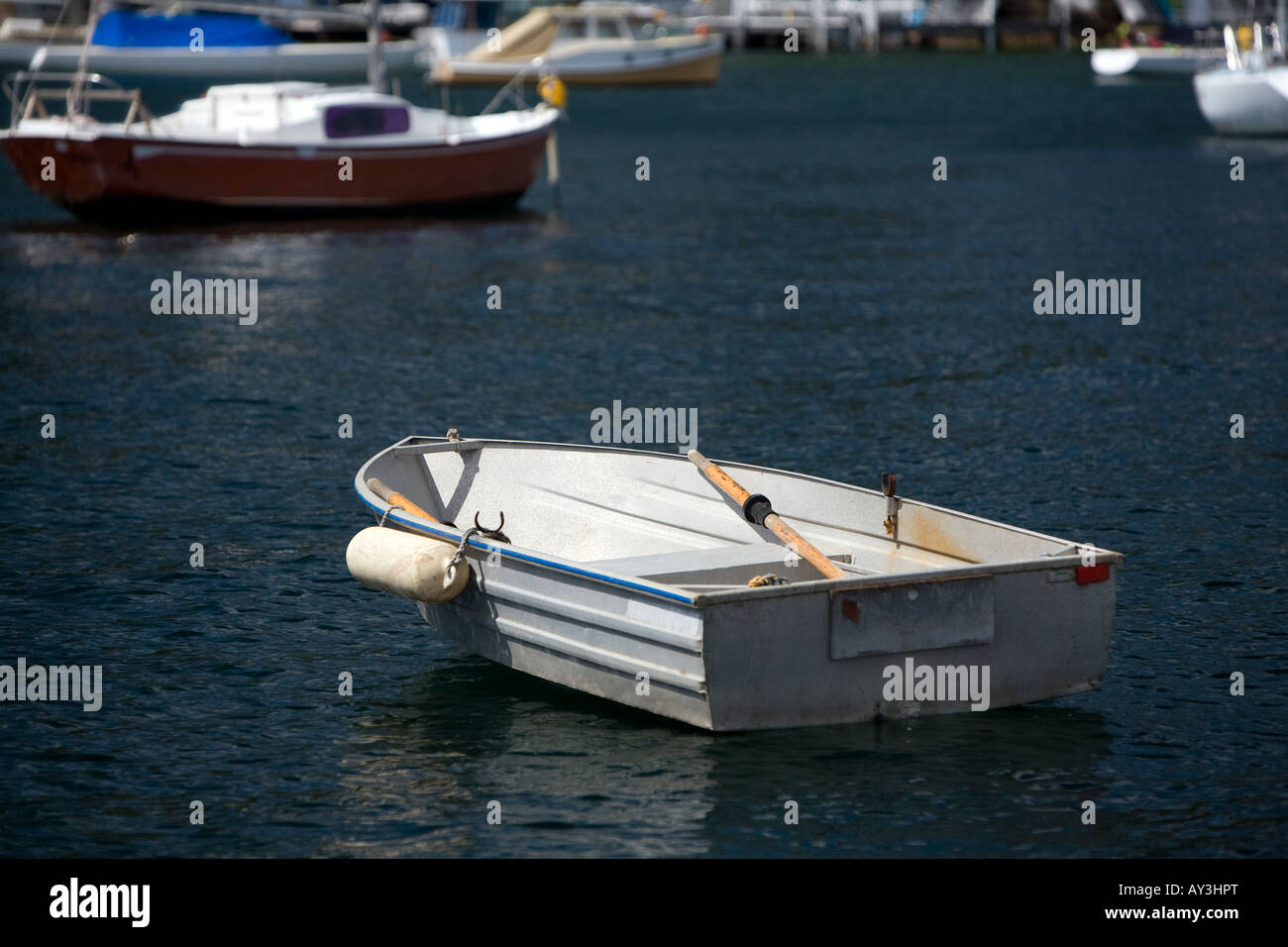 small rowing boat moored in pittwater,sydney,australia Stock Photo - Alamy