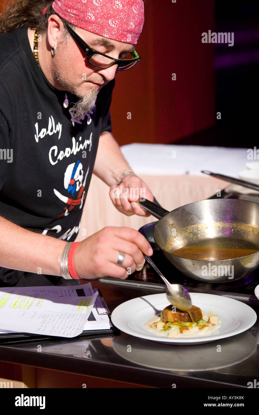 german cook preparing food in front of cameras Stock Photo - Alamy