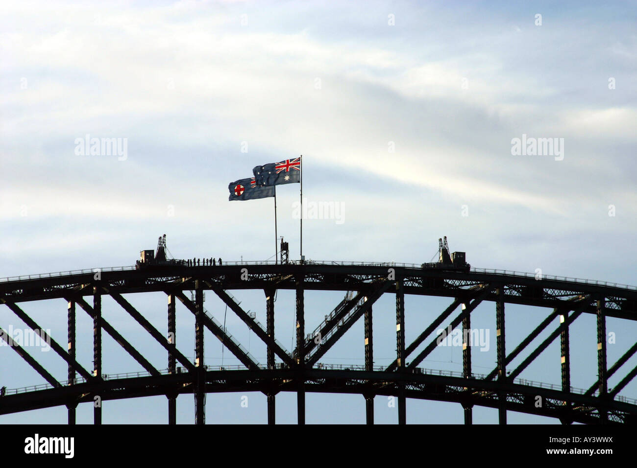 Sydney Opera House and tourists walking over the Sydney Harbour Bridge ...