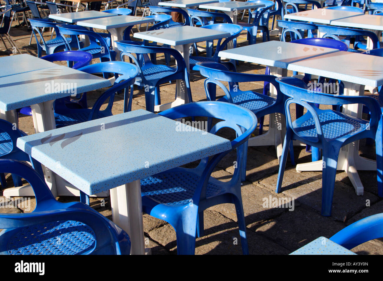 blue plastic tables and chairs Stock Photo - Alamy