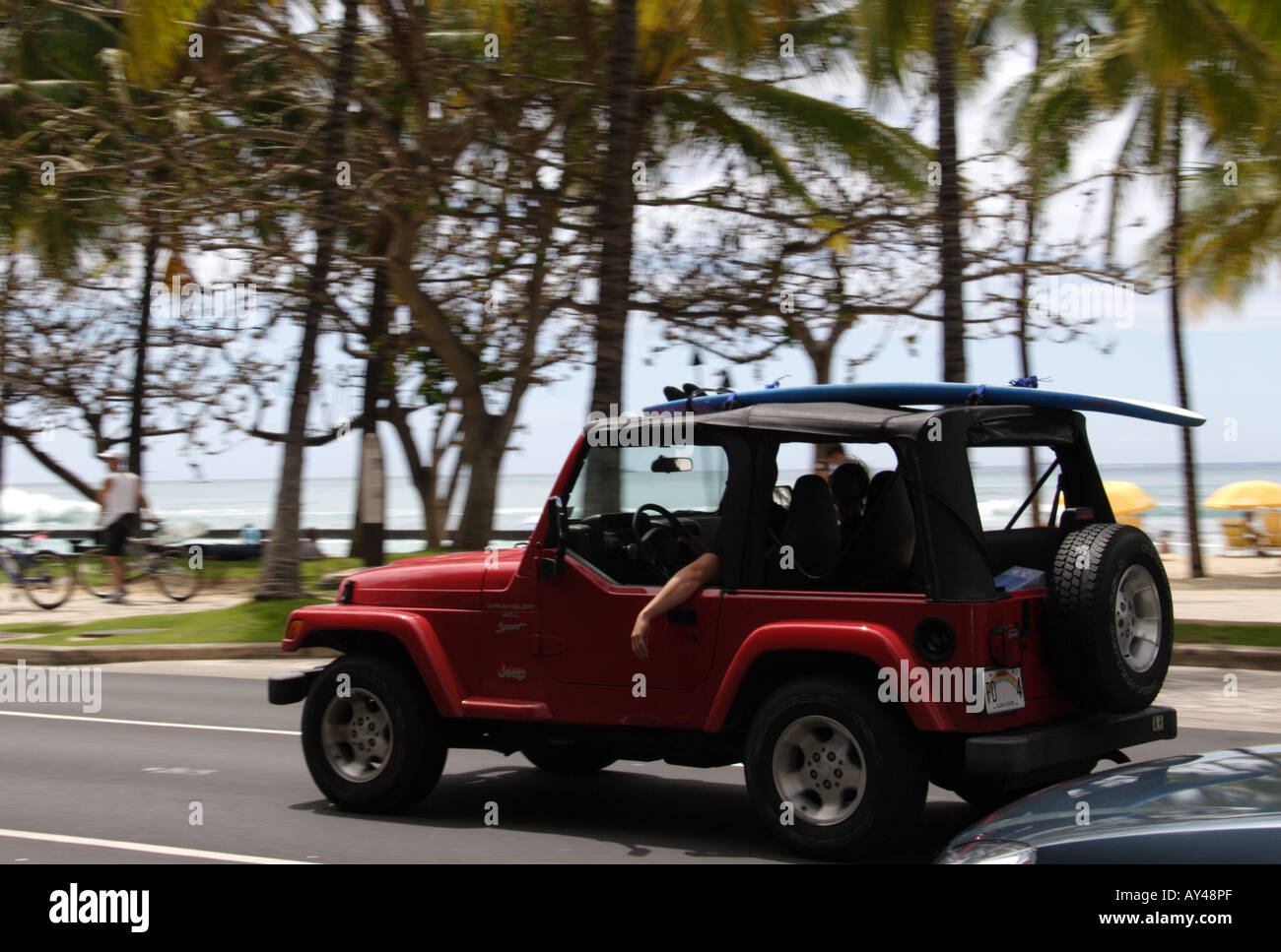Jeep with surfboard at Waikiki Beach Hawaii Stock Photo - Alamy