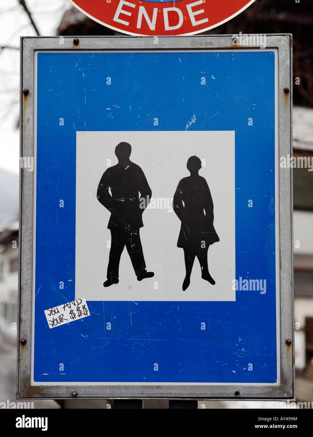 Street sign, depicting male & female figures Stock Photo - Alamy