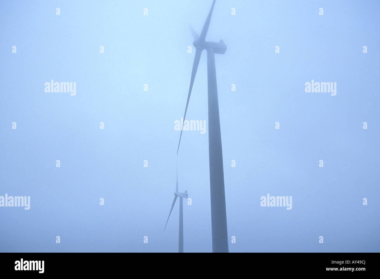 Wind turbines in the fog at a wind Farm Stock Photo - Alamy