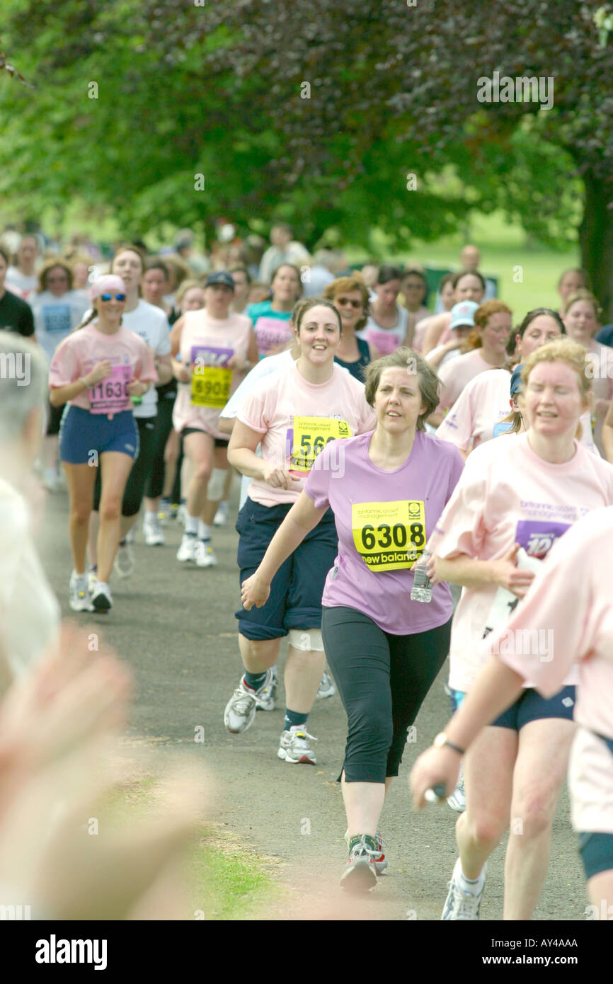 Women runners competing in road race Stock Photo - Alamy
