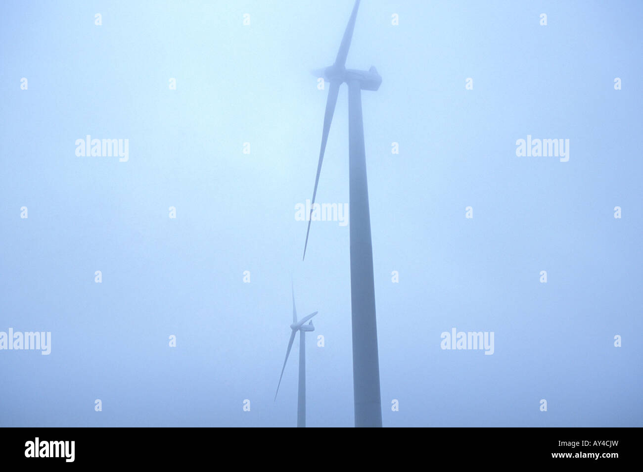 Wind turbines in the fog at a wind Farm Stock Photo - Alamy