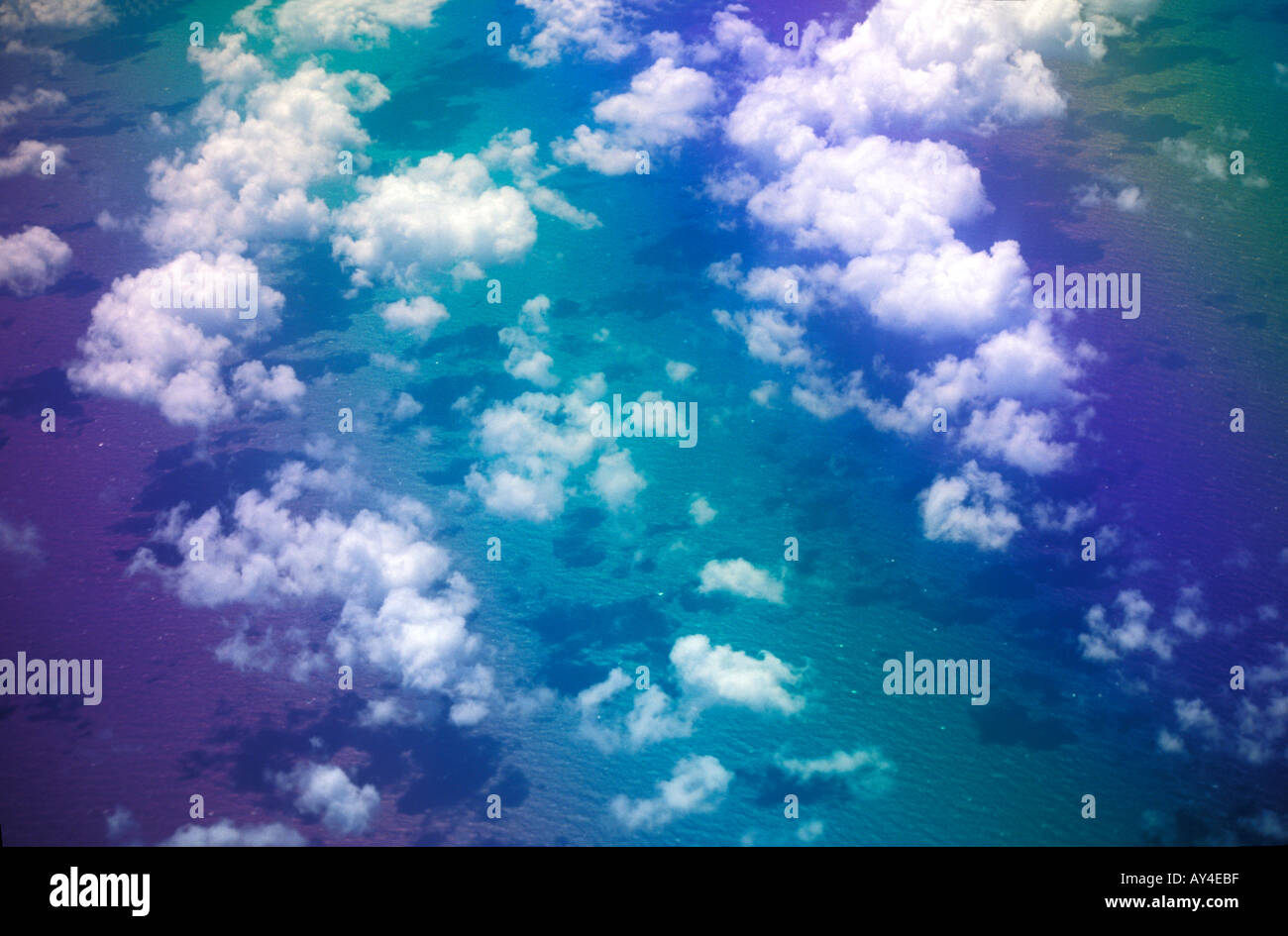 Airplane window view clouds on sea from 30 000 feet Stock Photo - Alamy