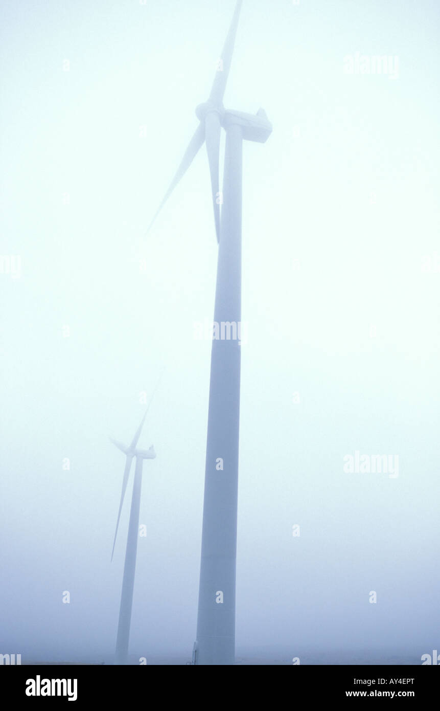 Wind turbines in the fog at a wind Farm Stock Photo - Alamy