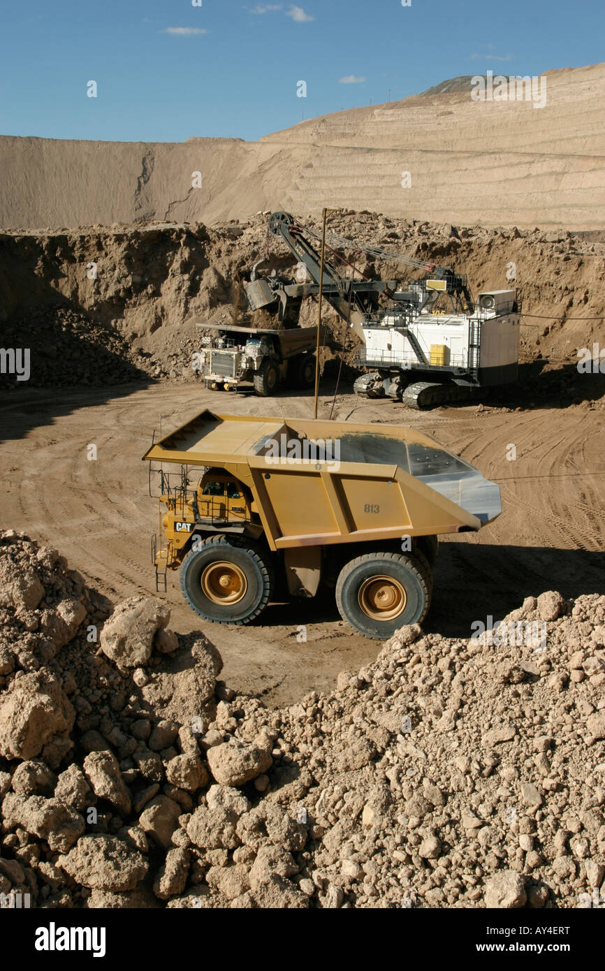 Light weight haul truck being filled with gold ore body for transport ...