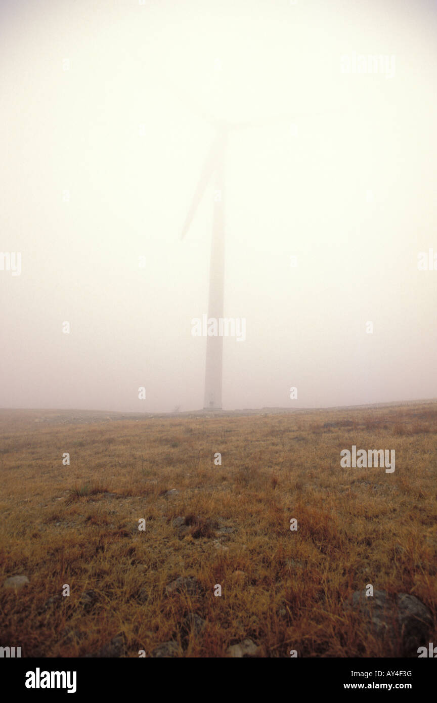 Wind turbines in the fog at a wind Farm Stock Photo - Alamy