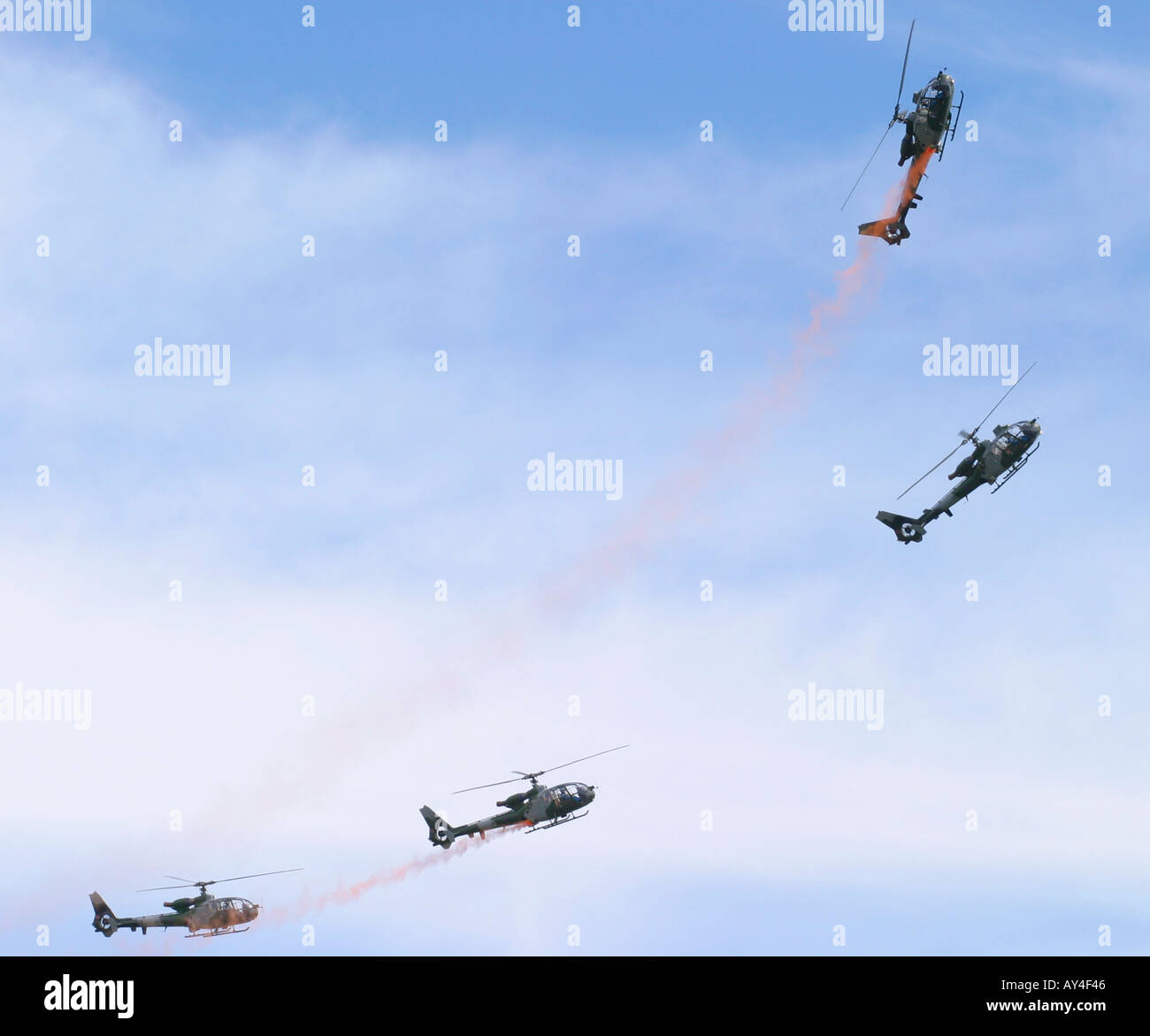 Four Gazelle helicopters in formation climb out Stock Photo - Alamy