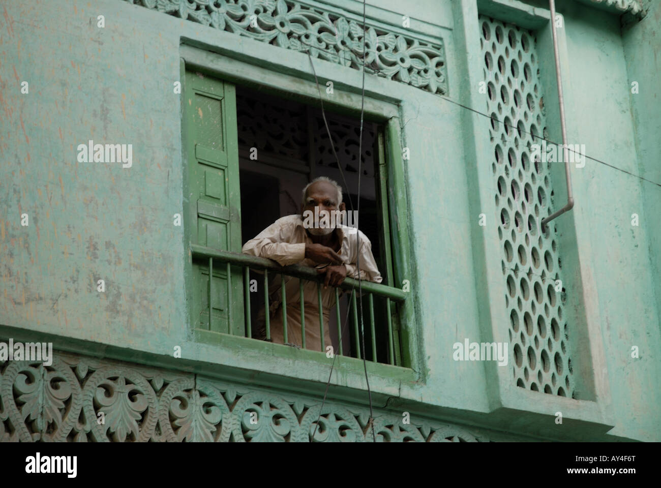 Man in window in Bundi Rajasthan India Stock Photo - Alamy