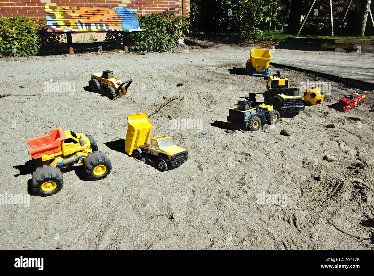 Toys in a sandbox Stock Photo - Alamy