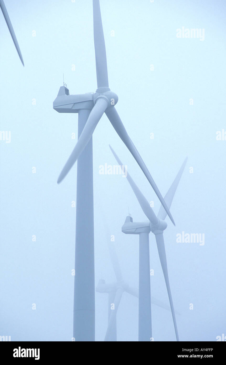 Wind turbines in the fog at a wind Farm Stock Photo - Alamy