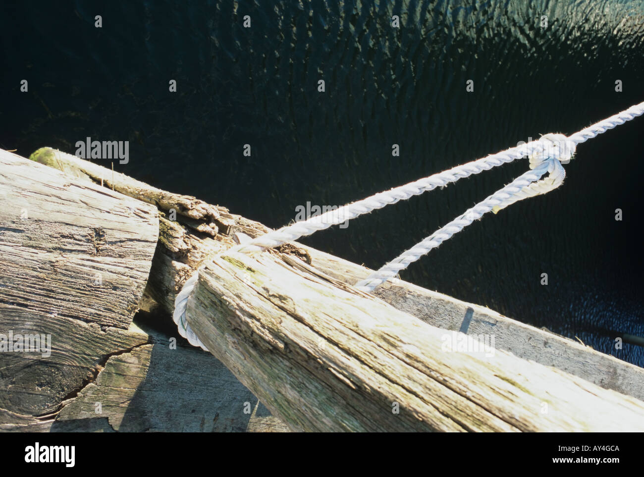 Wood piling with rope hi-res stock photography and images - Alamy