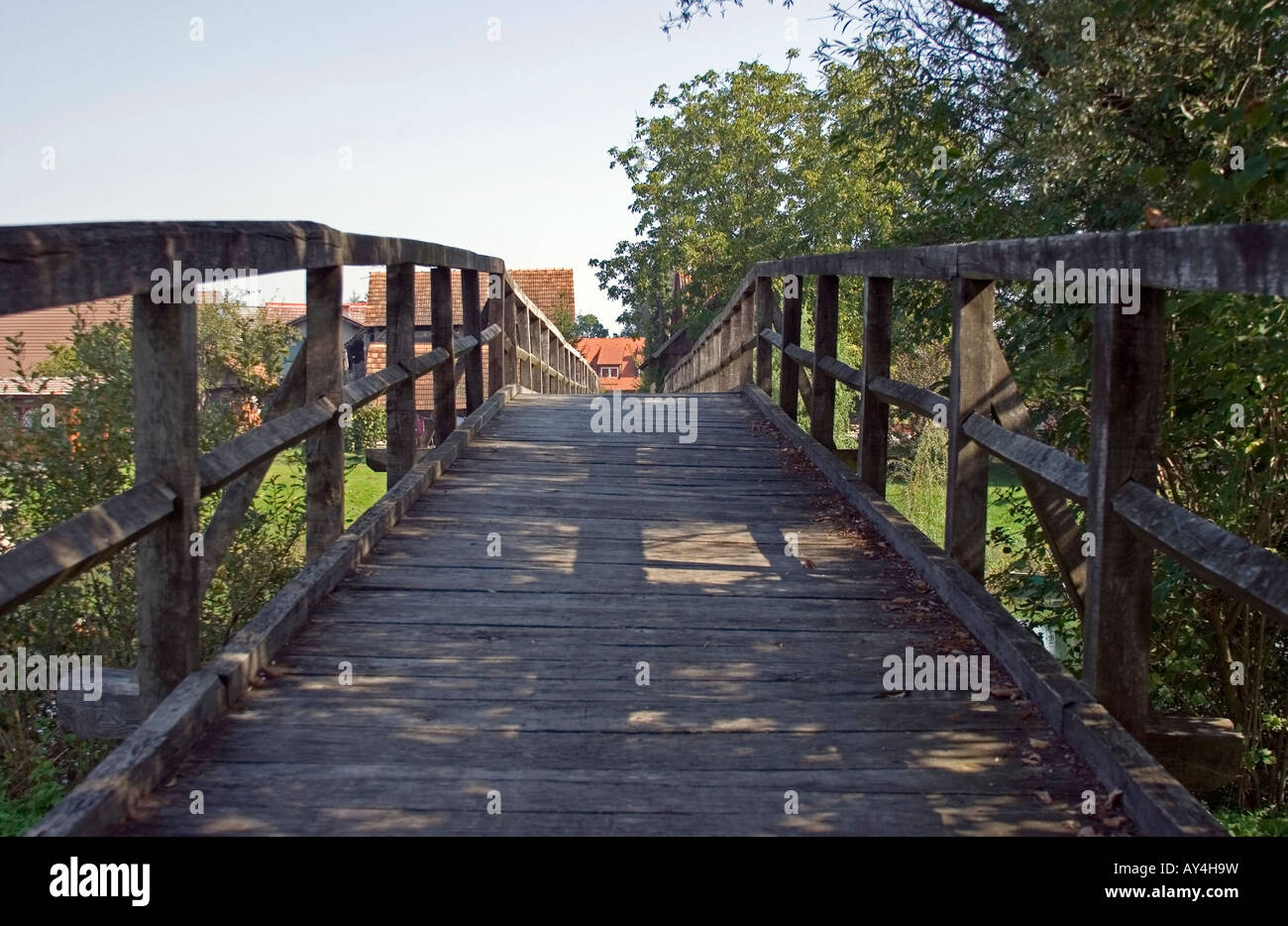 Hikers crossing bridge river hi-res stock photography and images - Alamy