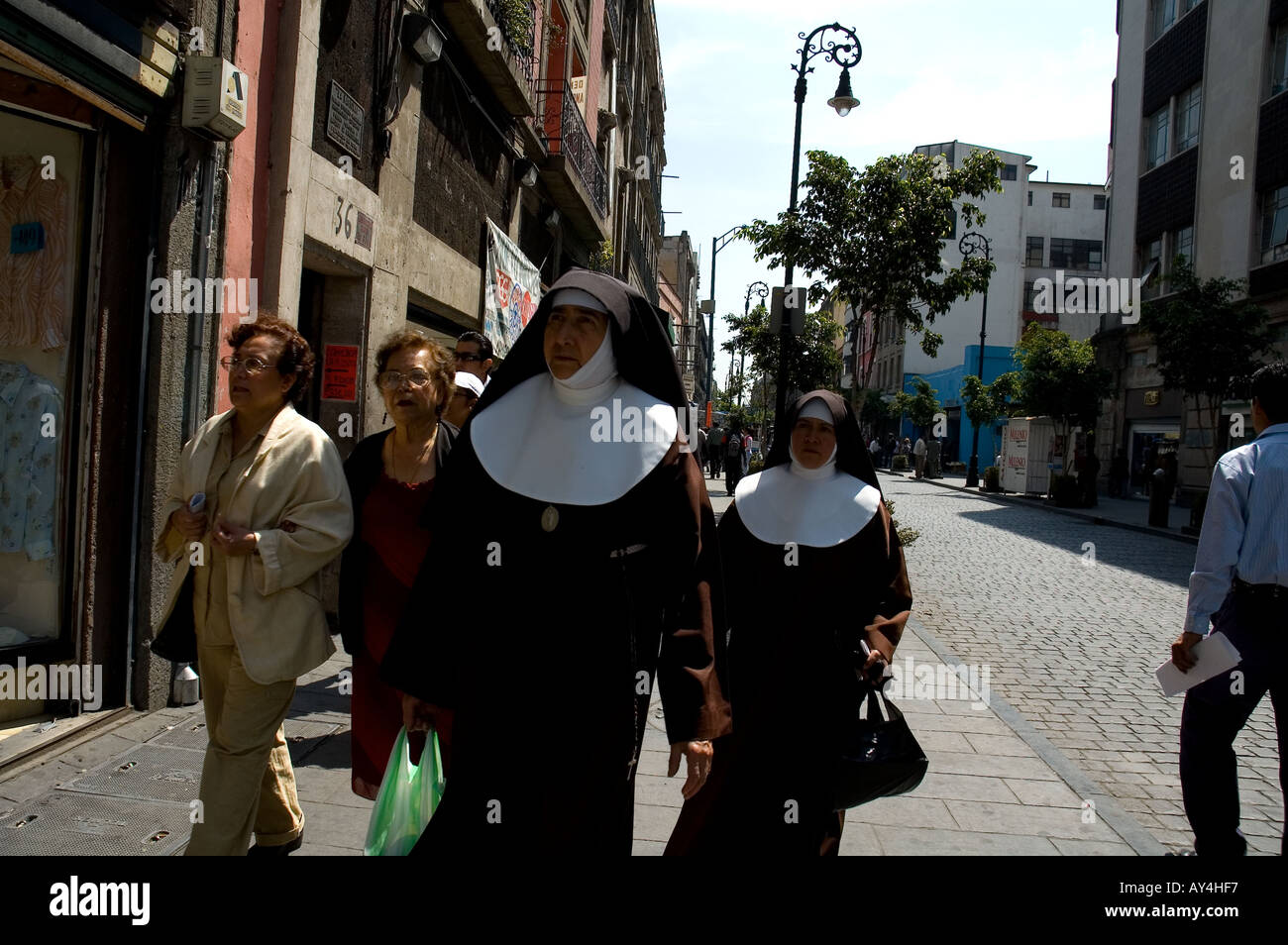 Two Catholic nuns walk in the historic center of Mexico City Stock ...