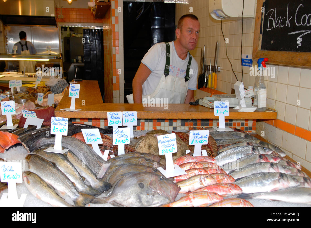 Fresh wet fish stall selling red snapper brill , salmon hake , John ...