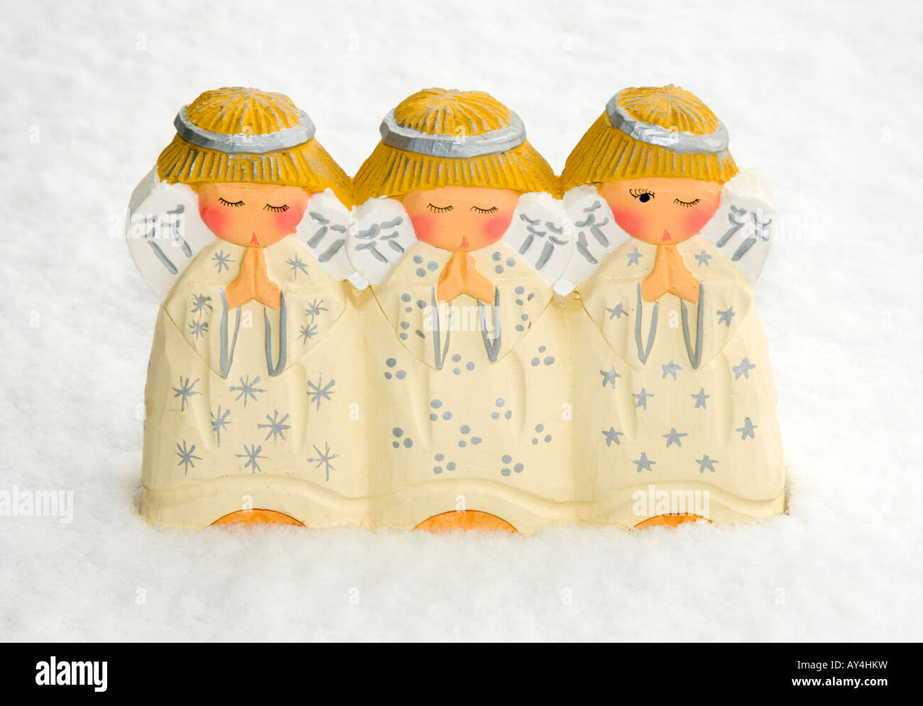 Three Angels Figurine Stock Photo - Alamy