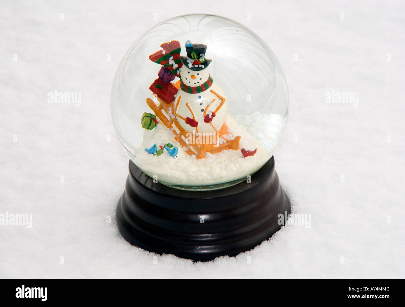 Snowman Snowglobe on snow Stock Photo - Alamy