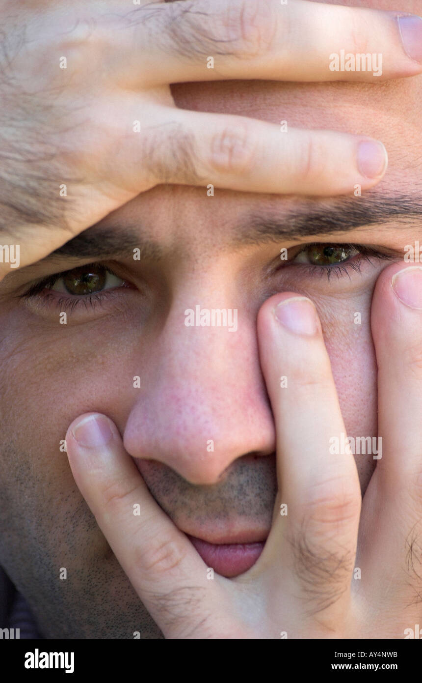 Hand across face hi-res stock photography and images - Alamy