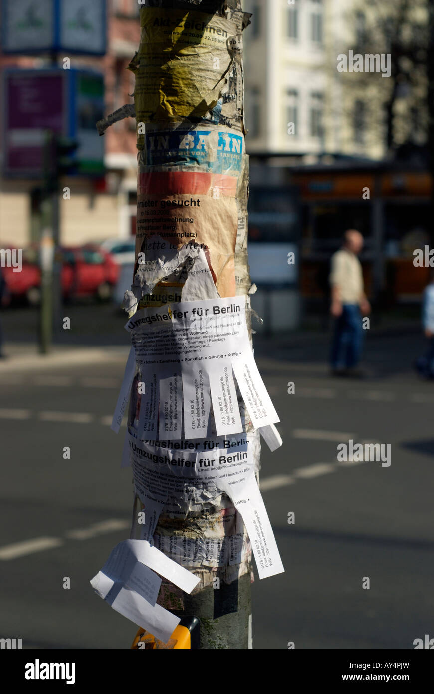 Lamp post plastered with ads and flyers in Berlin Germany Stock Photo ...