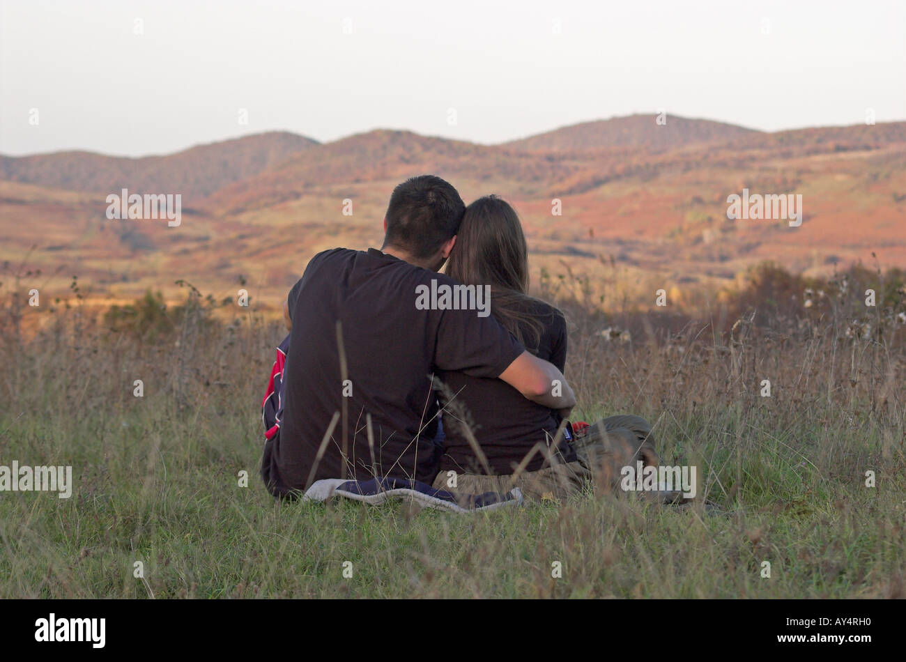 Young couple embracing on hi-res stock photography and images - Alamy