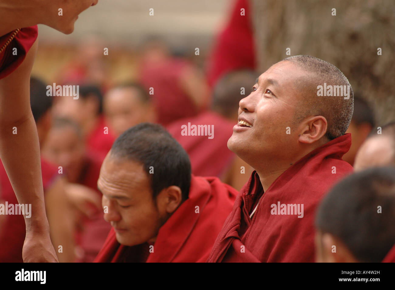 Monks debate in the courtyard of Sera Monastery in Lhasa Stock Photo ...