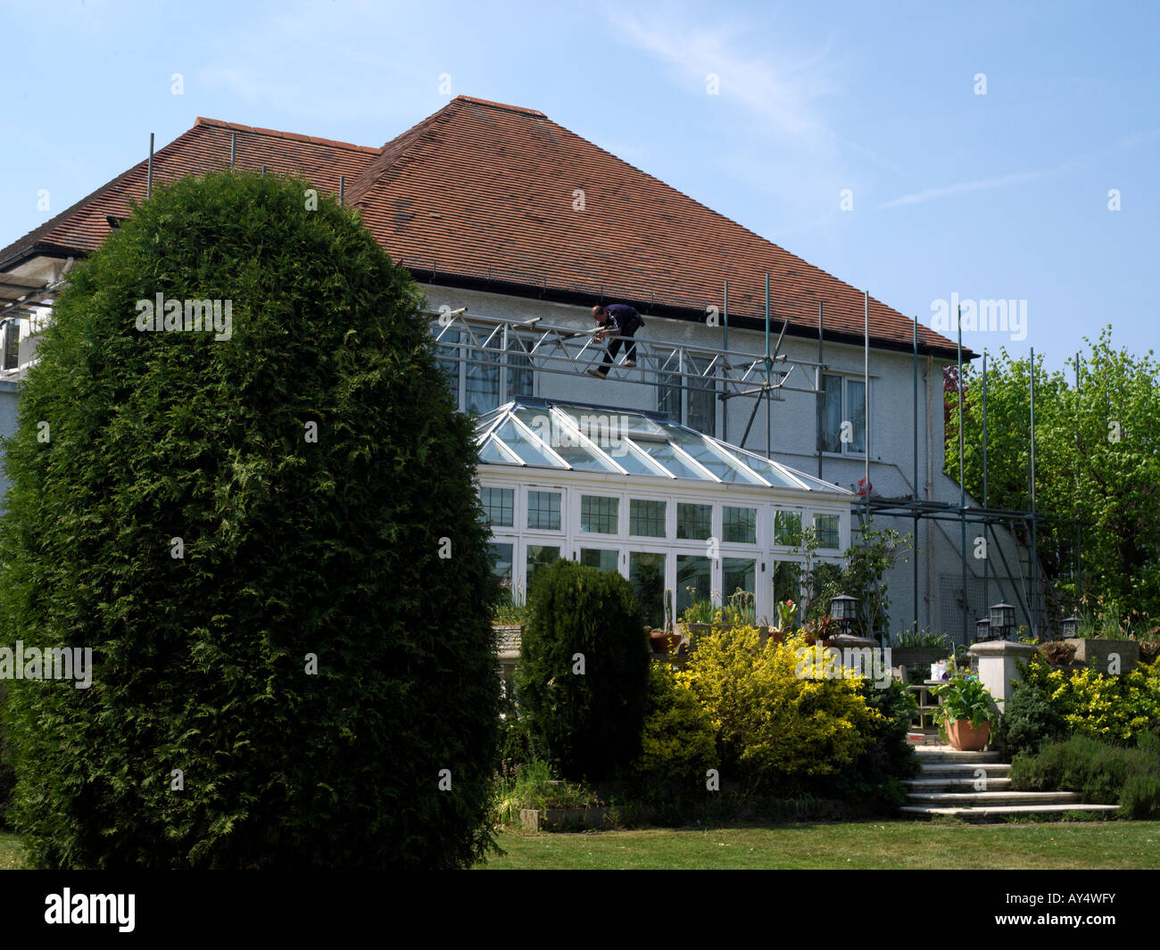 TST2P 0288 Garden and Detached House Cheam Surrey England Erecting ...