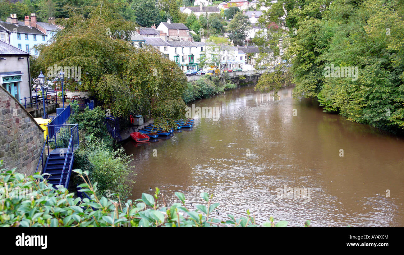 the river derwent at matlock bath,derbyshire,with colourful blue rowing ...