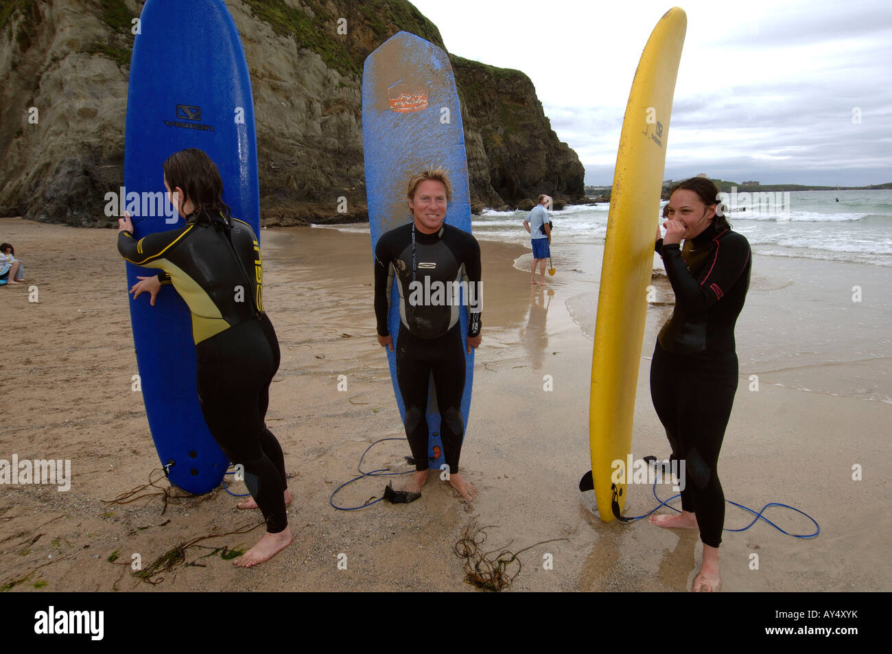 Cornwall board surfers on Newquay beach Stock Photo - Alamy