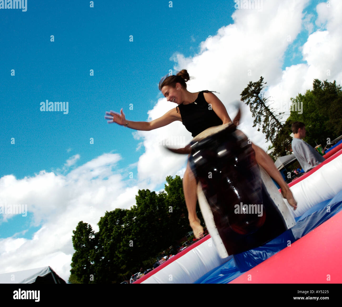 Girl Riding Mechanical Bull High Resolution Stock Photography and ...
