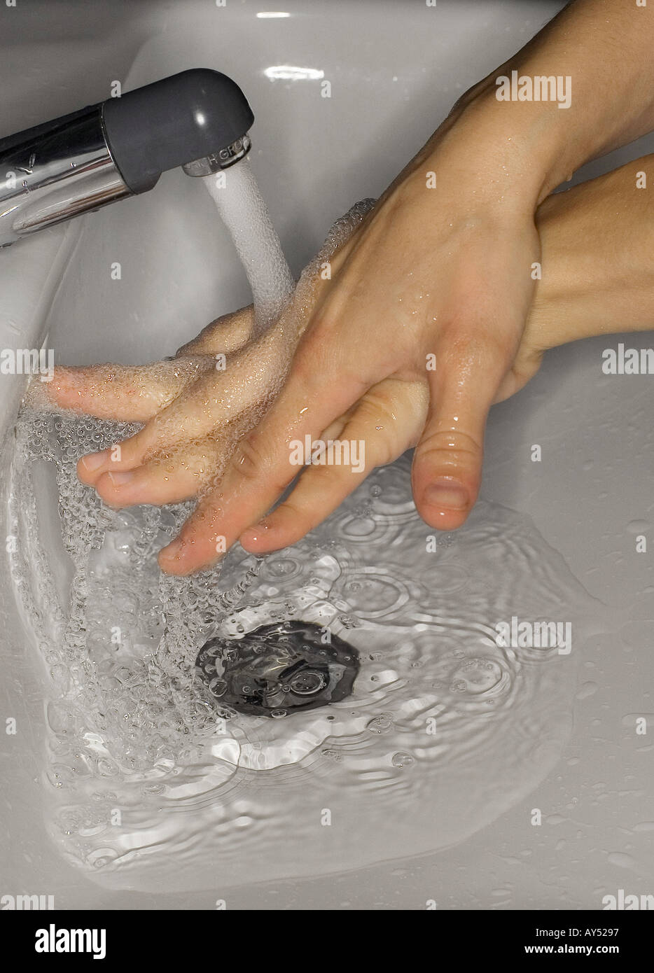 Running Water on Hands Stock Photo - Alamy