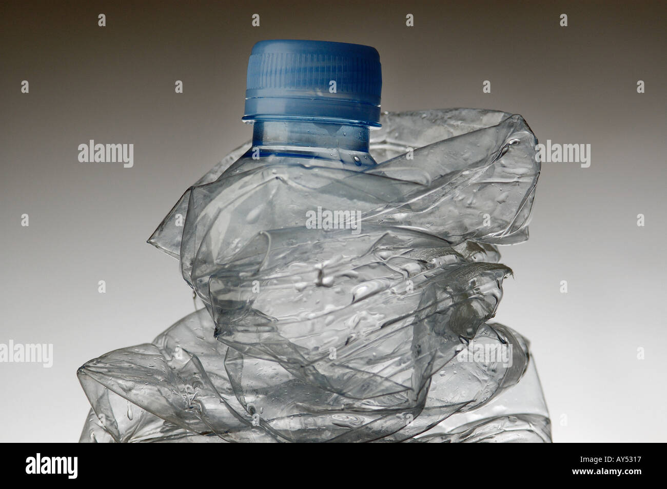 RECYCLING BOTTLE OF WATER CRUMPLED Stock Photo - Alamy