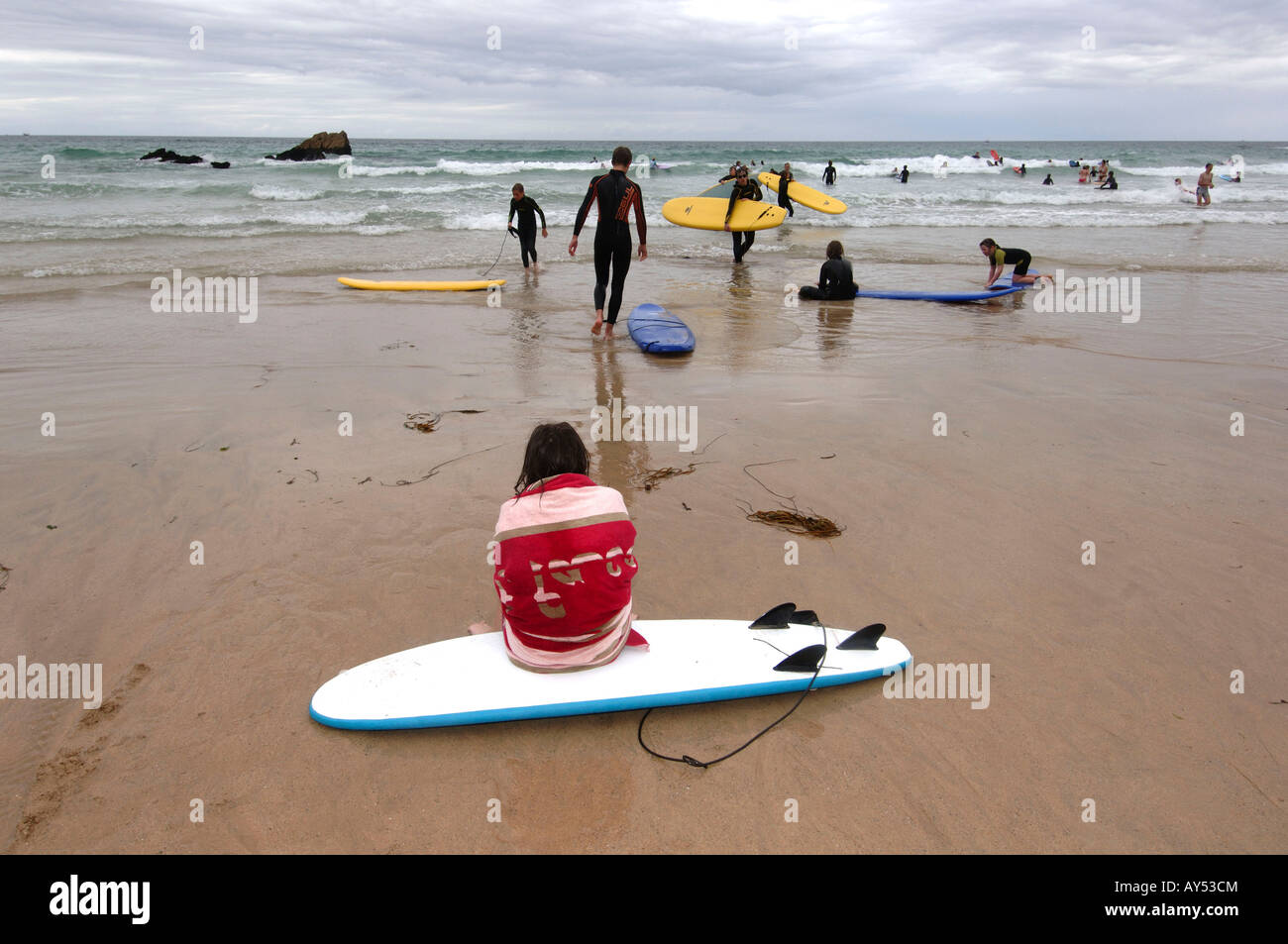 Cornwall board surfers on Newquay beach Stock Photo - Alamy