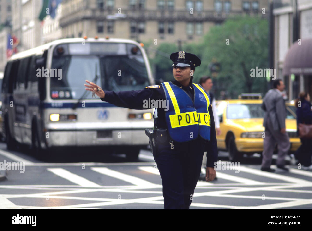 African american female police officer in New York City directing ...