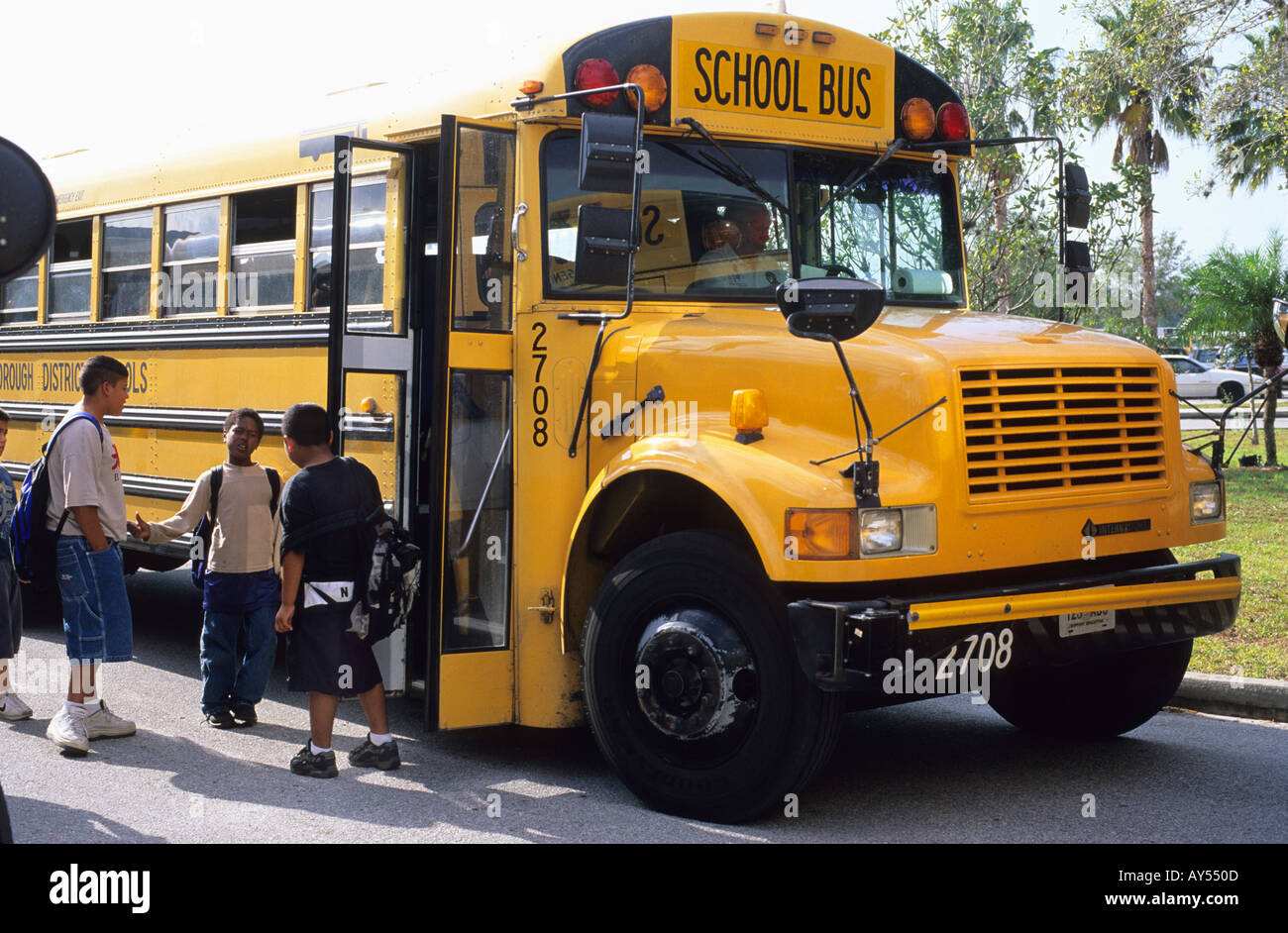 School children waiting to get on the school bus Stock Photo - Alamy