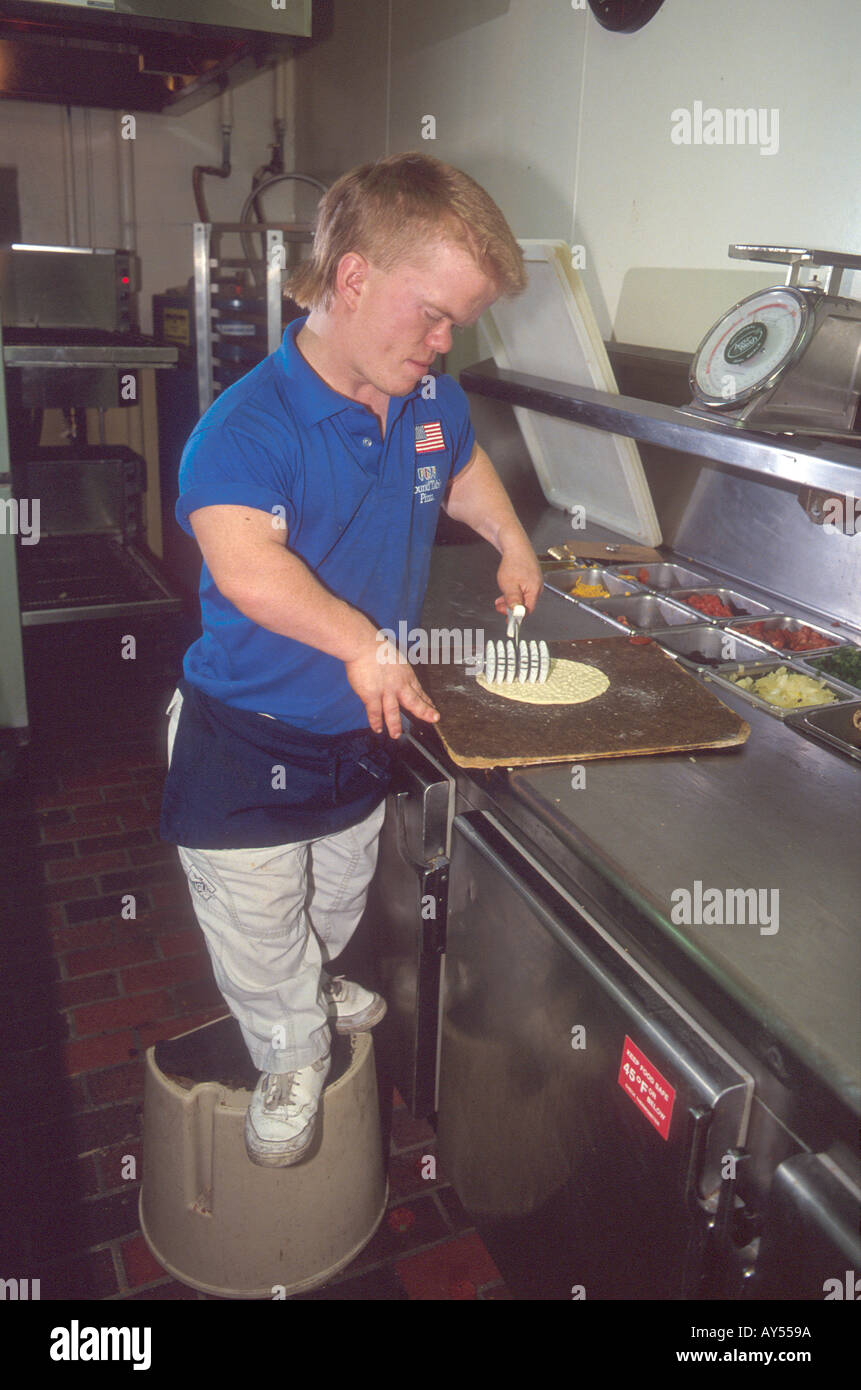 Dwarf working as a pizza chef MR Stock Photo - Alamy
