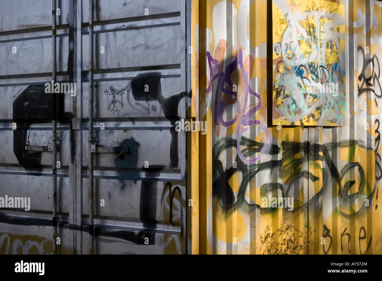 Colorful graffiti sprayed onto an old 20ft cargo container Stock Photo ...
