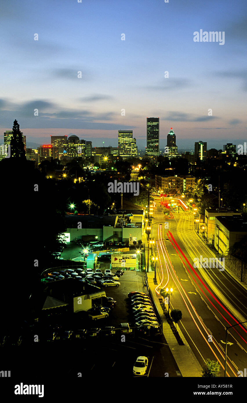 Downtown buildings illuminated at dusk as viewed from the Vista Bridge ...