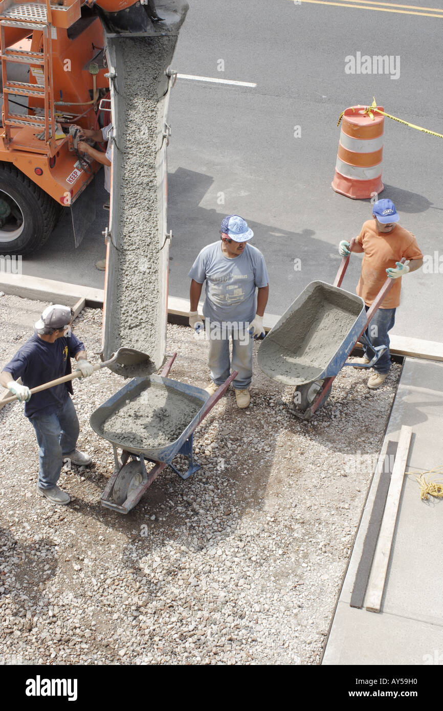 Workers pouring cement sidewalk hi-res stock photography and images - Alamy