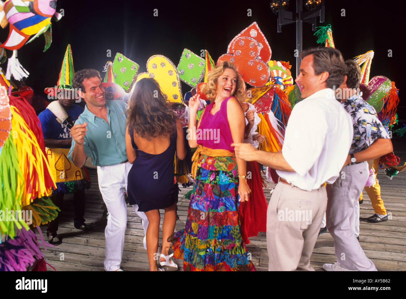 Colorful Scene of Tourists Enjoying Carnival with Natives Dancing Stock ...