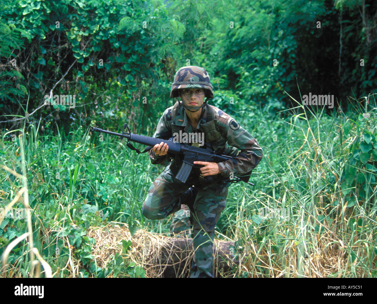 female soldier in combat gear Stock Photo - Alamy